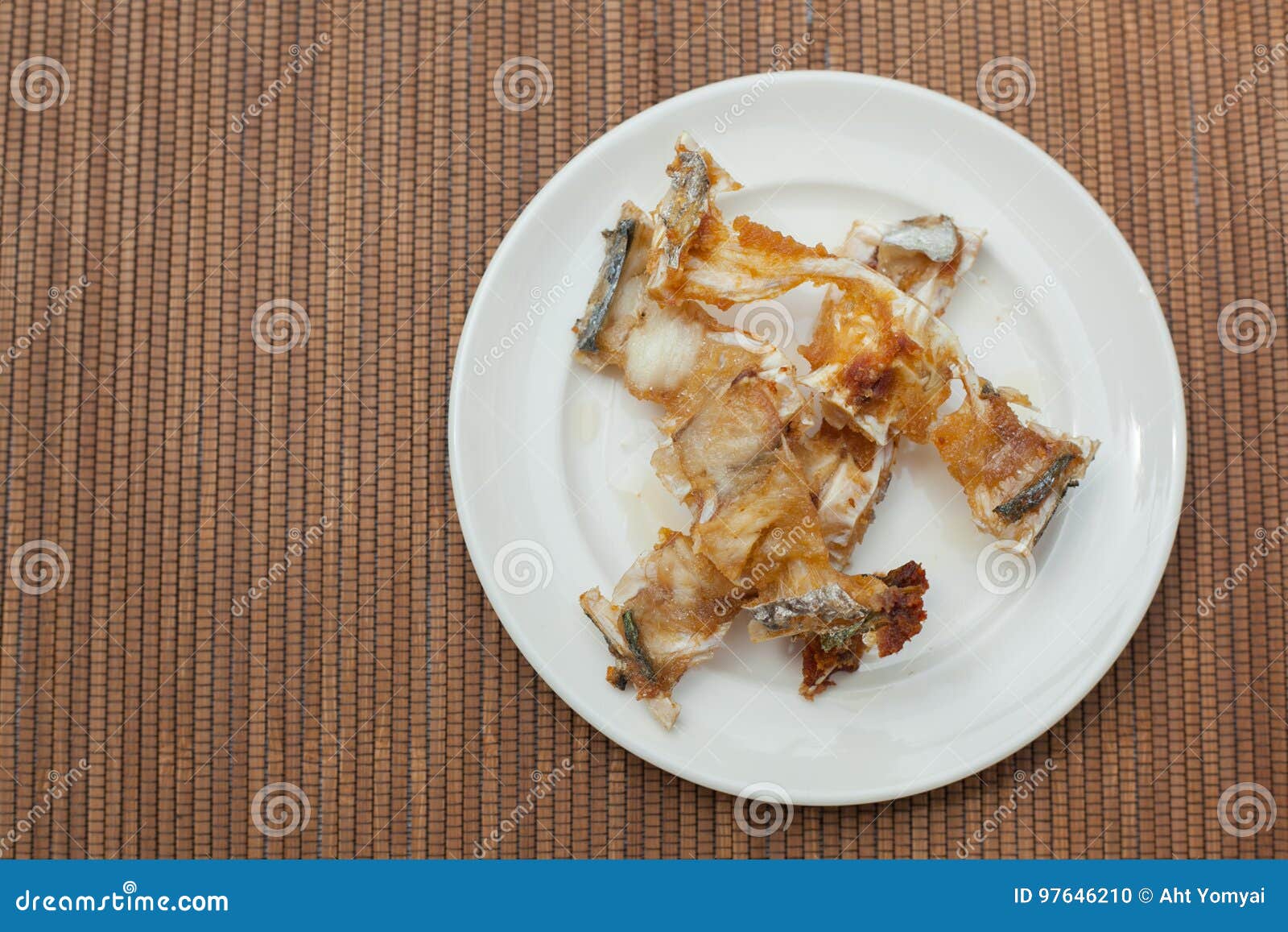 Fish bones on a plate stock photo. Image of prepared - 97646210