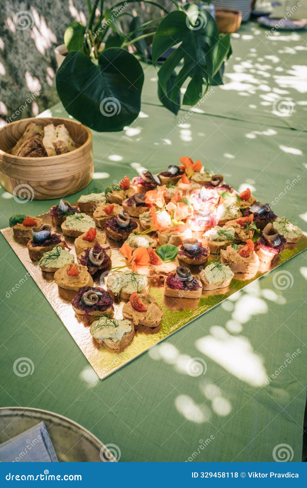 Fish canapes on a table stock photo. Image of plate - 329458118