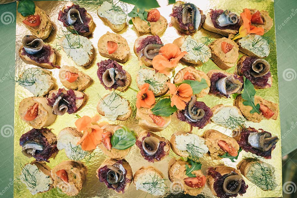 Fish canapes on a table stock photo. Image of decoration - 329458136