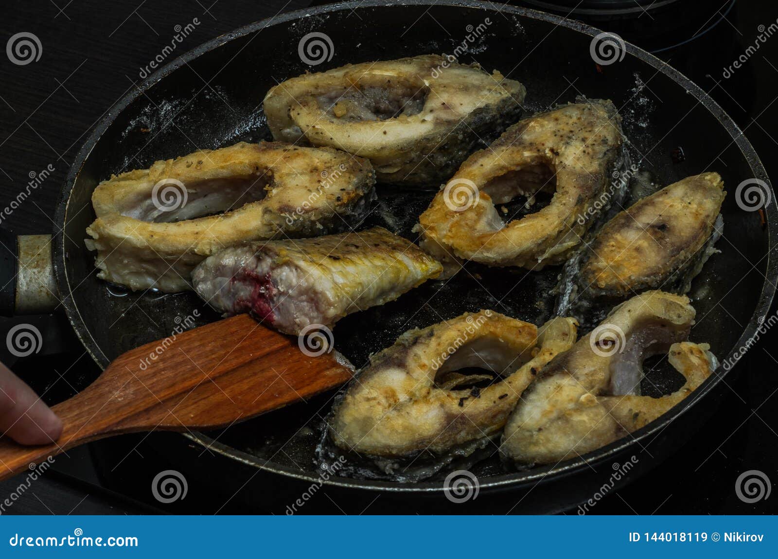 Fish carp fried in a pan stock image. Image of cooked - 144018119