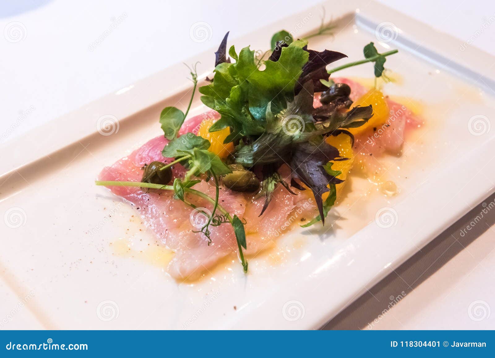 Fish Carpaccio of Yellowtail with Salad Stock Image - Image of ...