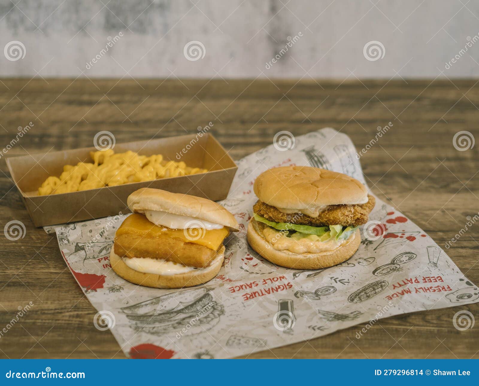 Fish and Chicken Burger with a Tray of Cheese Fries Stock Photo - Image ...