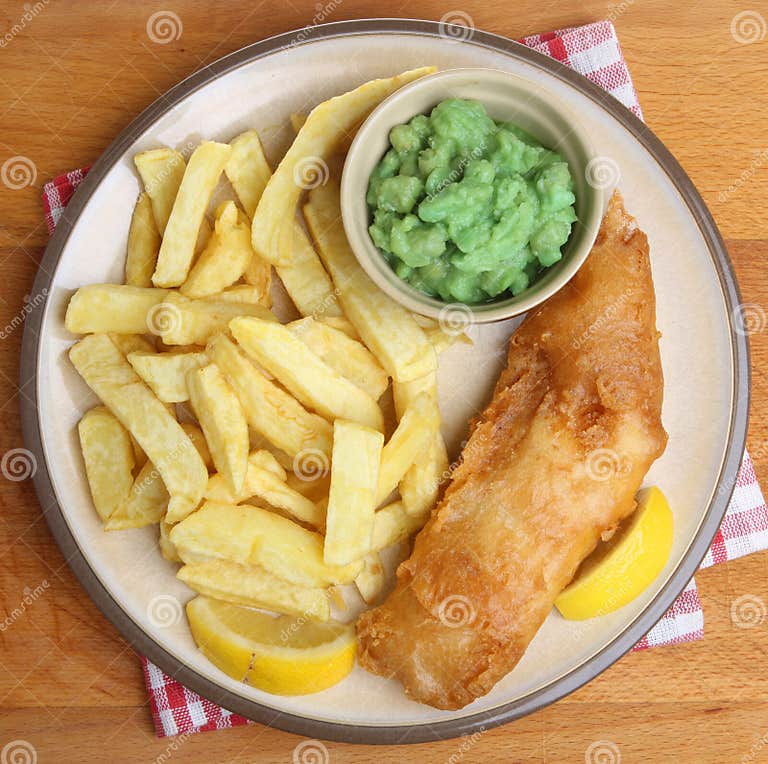 Fish, Chips and Mushy Peas stock photo. Image of crispy - 33621032
