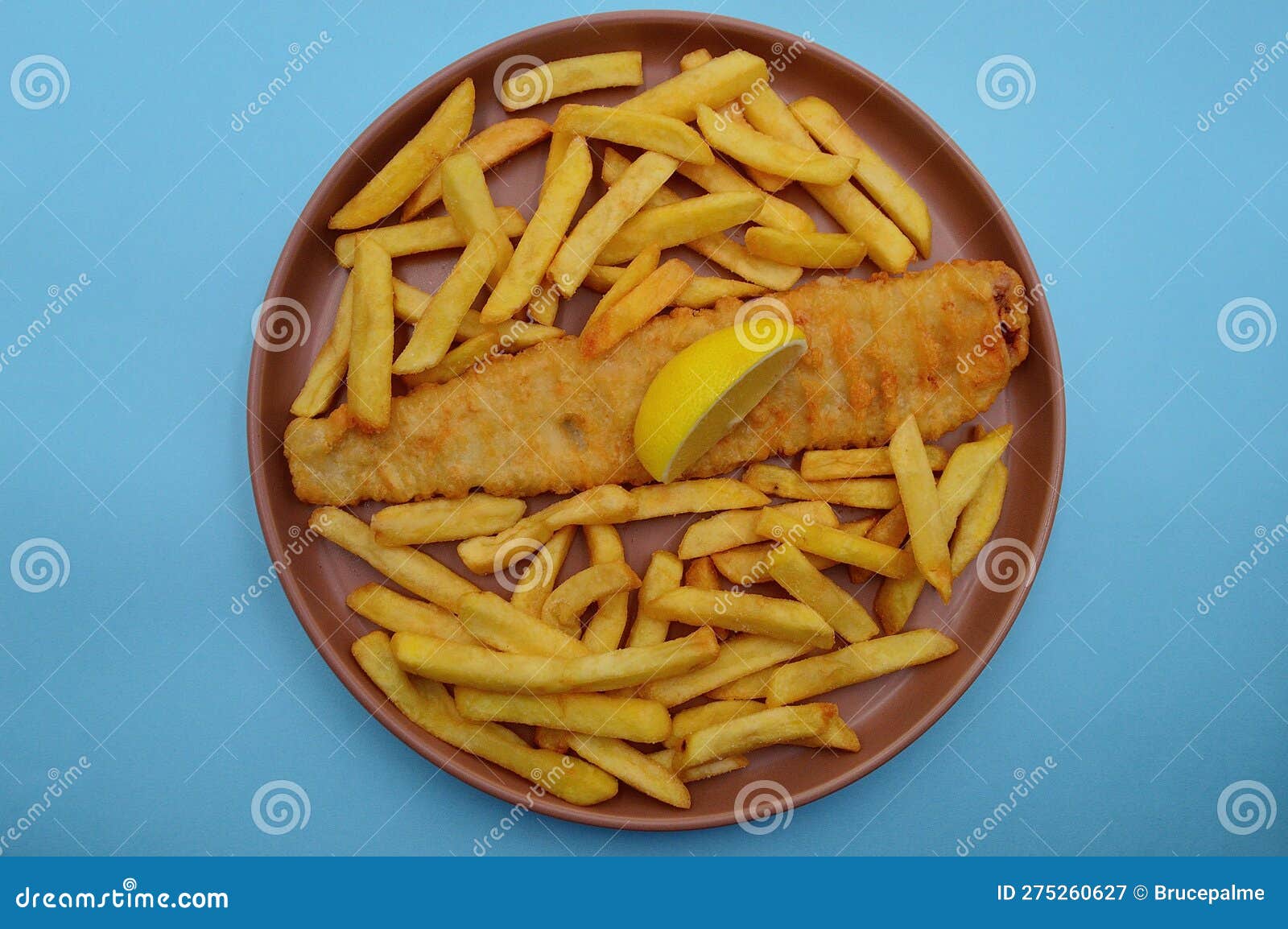 Fish and Chips on a Plate with a Squeeze of Lemon Stock Image - Image ...