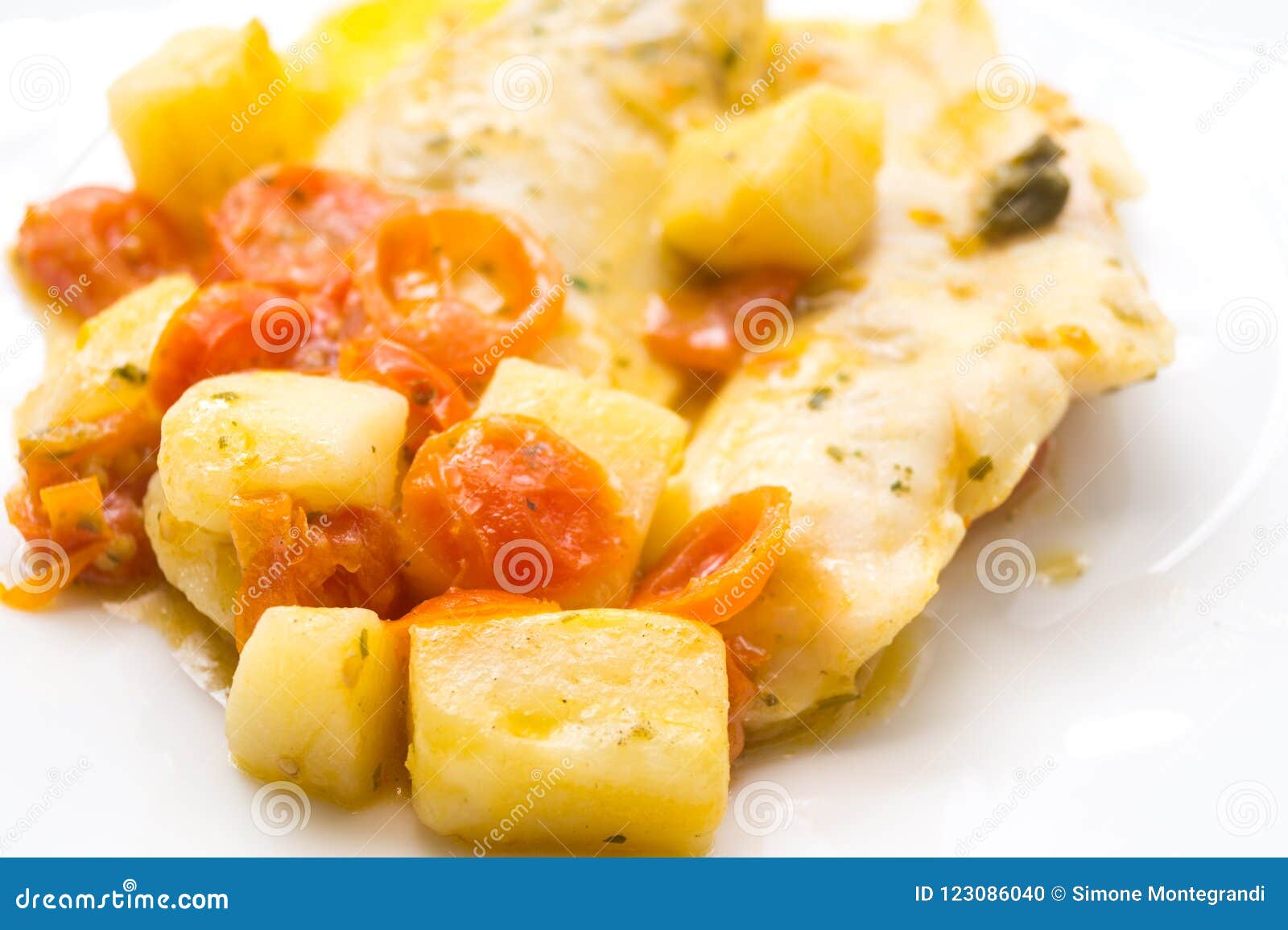 Fish Cooked in a Pot, Cod with Red Tomato and Potatoes Stock Photo ...