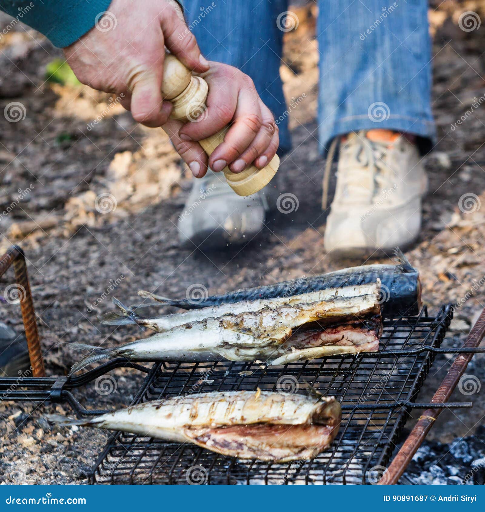 Fish cooked on fire stock image. Image of forest, flames - 90891687