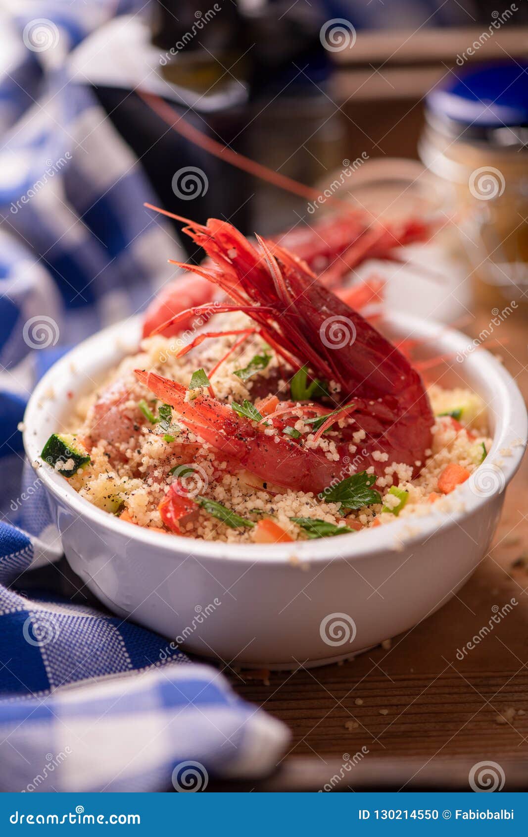 Fish couscous with prawns stock photo. Image of semolina - 130214550