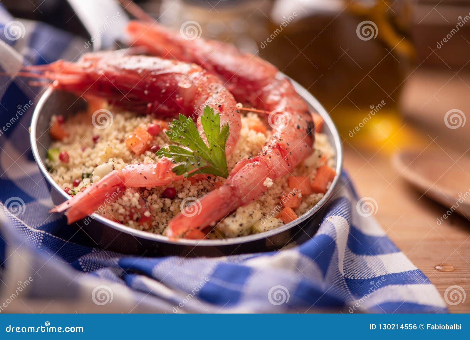 Fish couscous with prawns stock photo. Image of dinner - 130214556