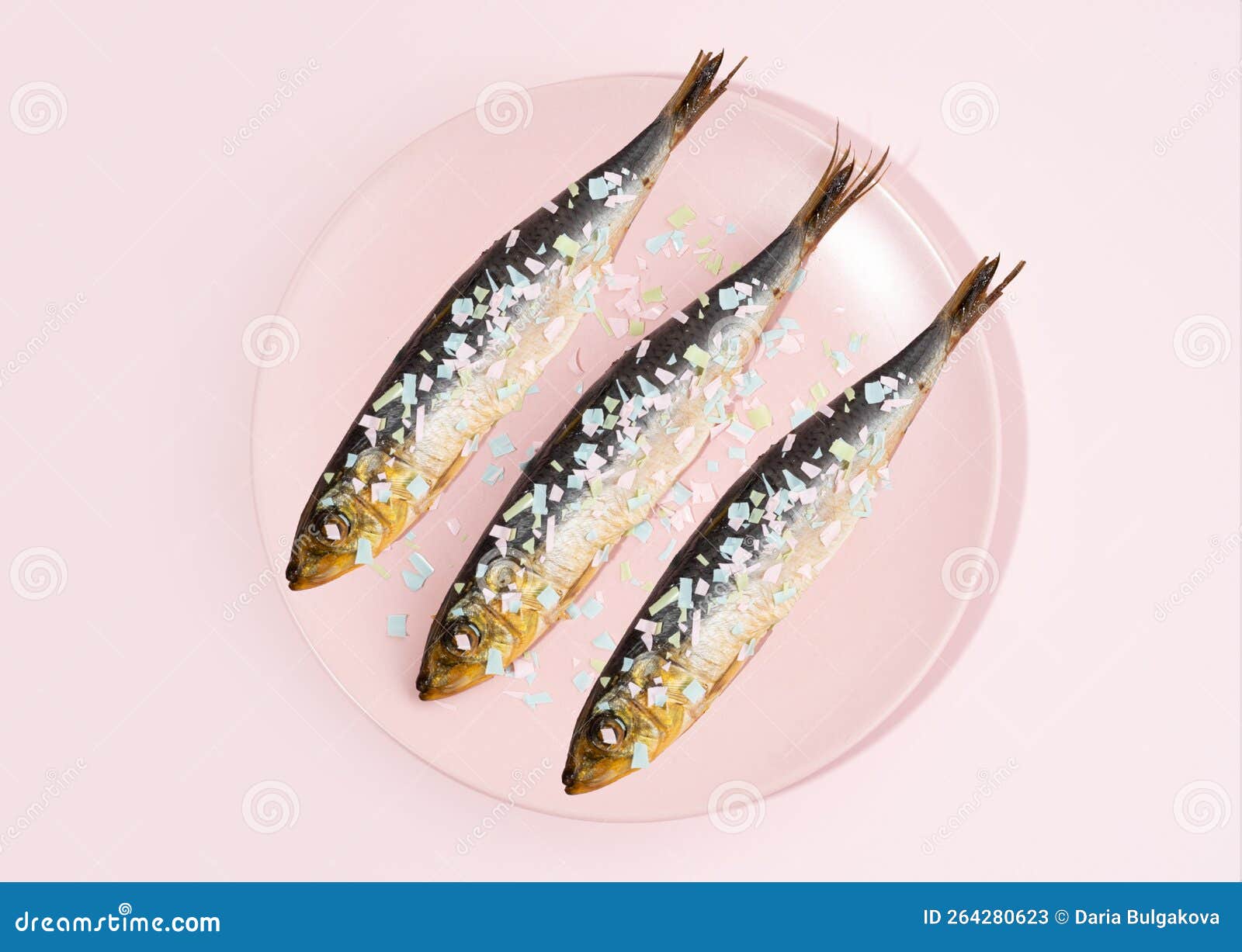 Fish Covered Microplastic on a Pink Plate. Impact of Micro Plastic on ...