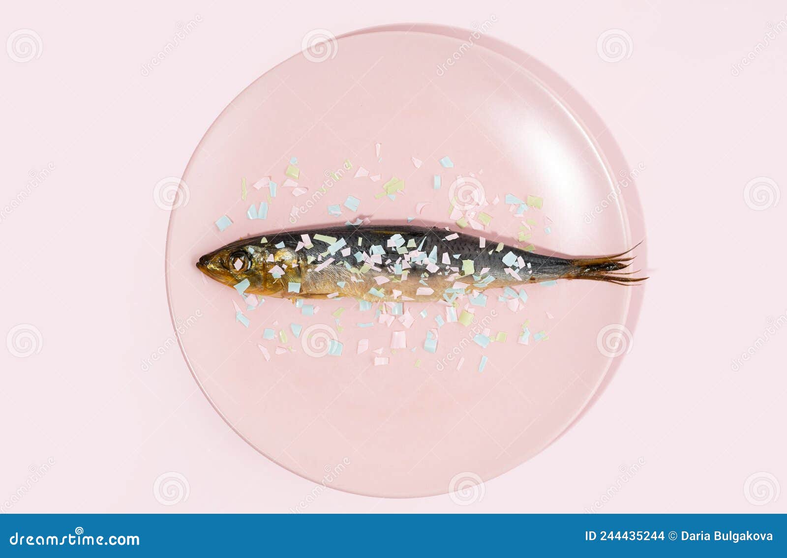 Fish Covered Microplastic on a Pink Plate. Impact of Micro Plastic on ...