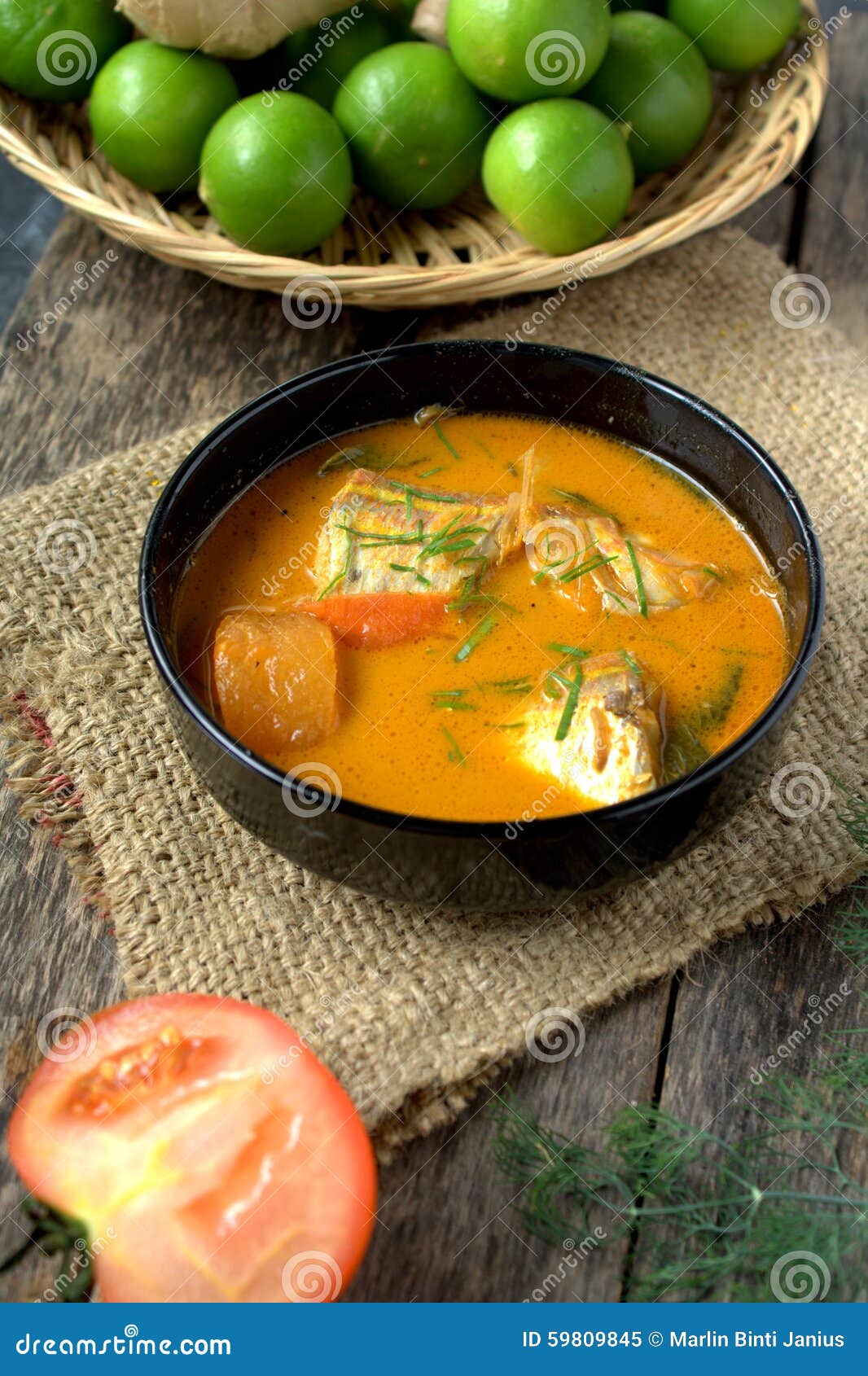 Fish curry in black bowl stock image. Image of dinner - 59809845