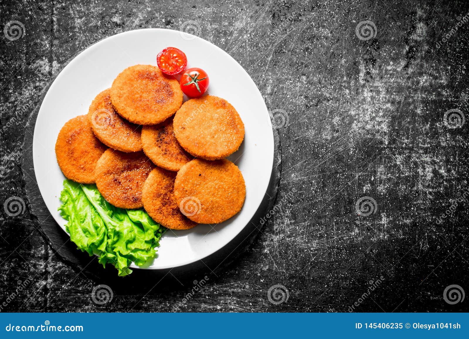 Fish Cutlets on a Plate with Salad Leaves and Tomatoes Stock Image ...