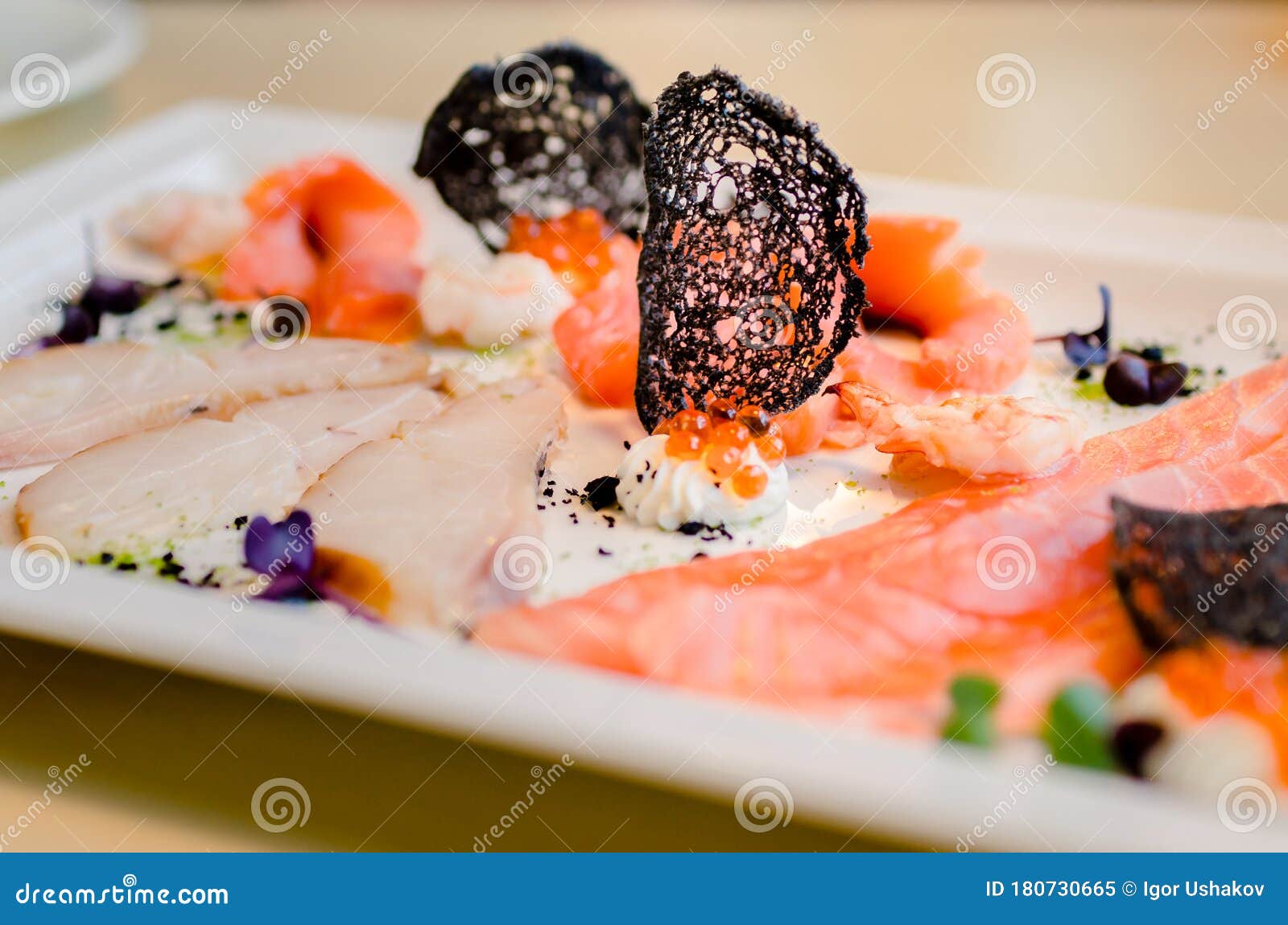 Fish Cutting. Pieces of Different Fish on a Plate with Cream Cheese and ...