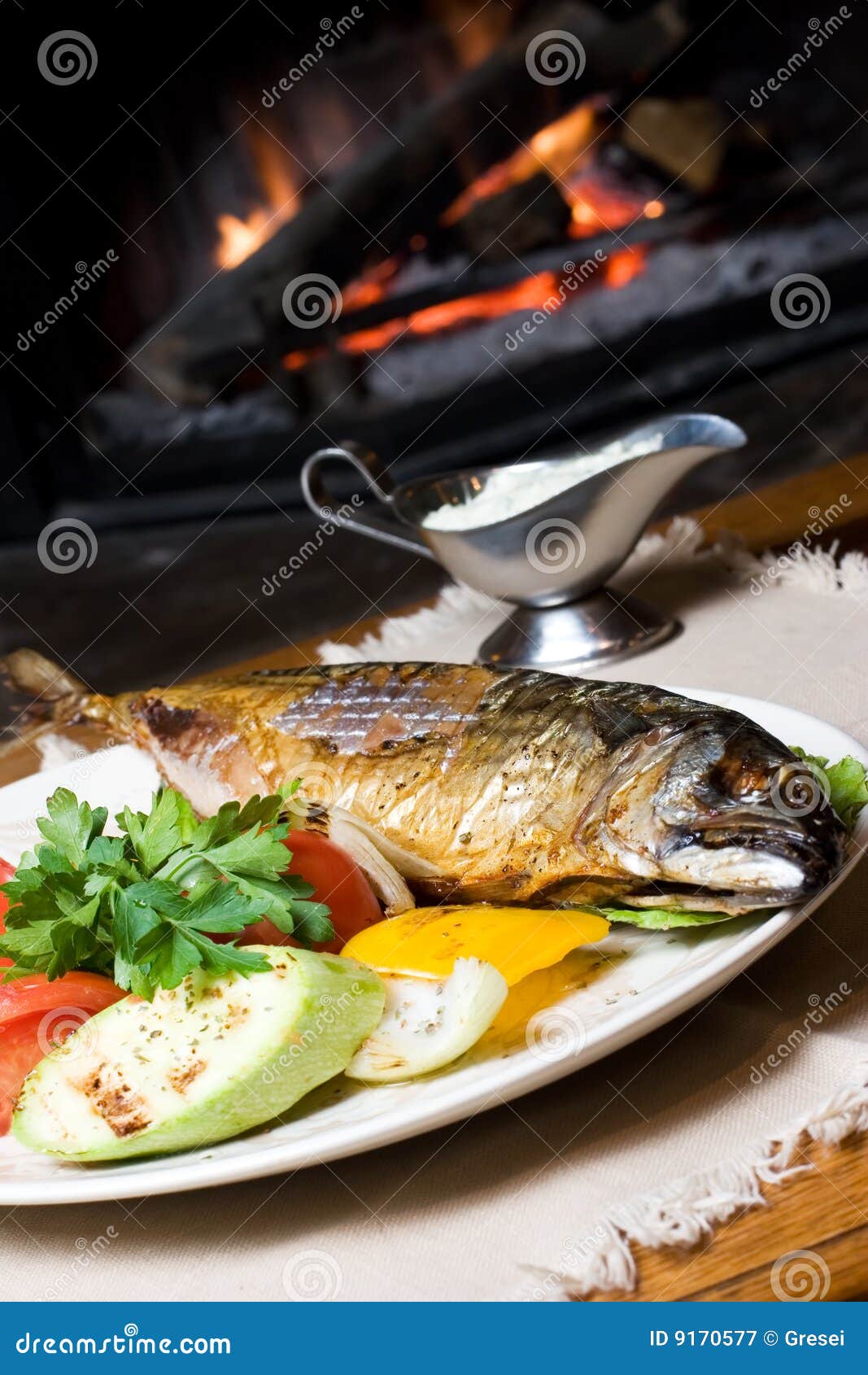 Fish dinner stock image. Image of zucchini, tomatoes, meal - 9170577