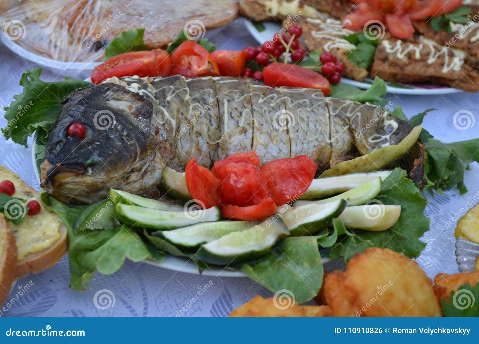 Fish dish on a plate. stock photo. Image of cucumbers - 110910826