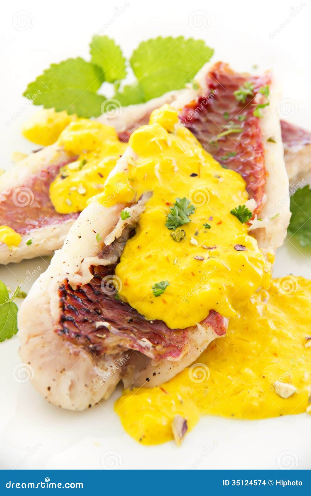 Fish Fillet with Saffron Sauce Stock Photo - Image of marine, closeup ...