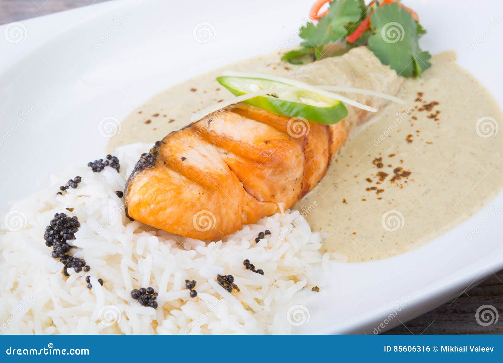 Fish Fillet Served with Rice Stock Photo - Image of restaurant, indian ...