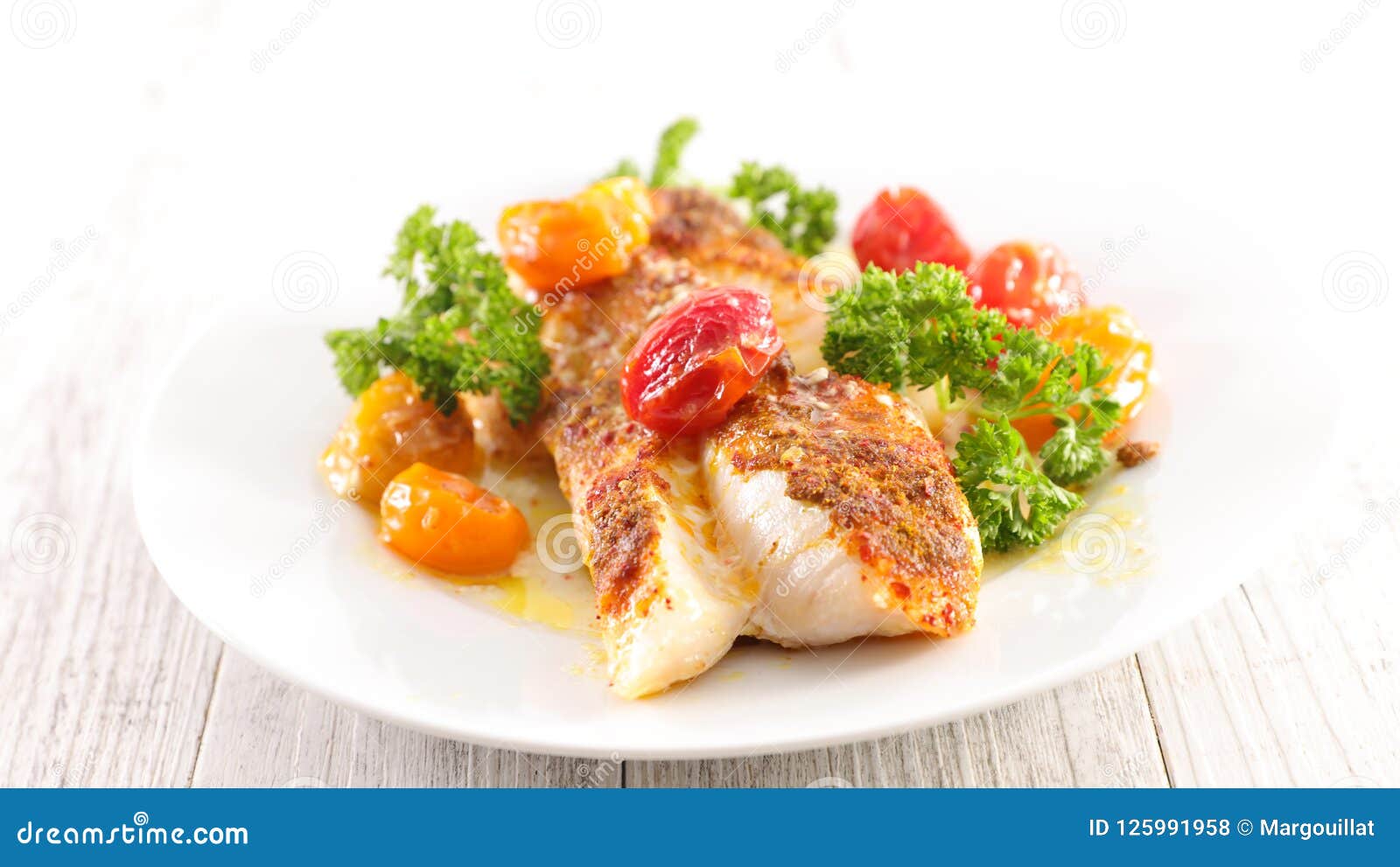 Fish fillet and tomato stock photo. Image of fillet - 125991958