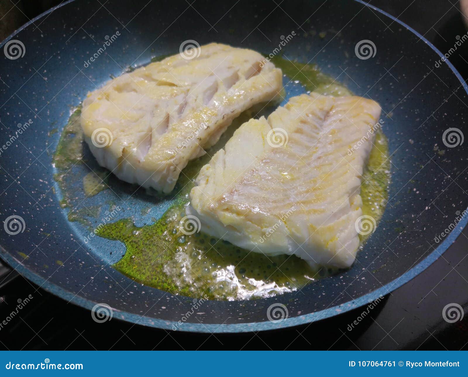 Fish Fillets Sizzling in Oil Stock Image - Image of fish, fillets ...