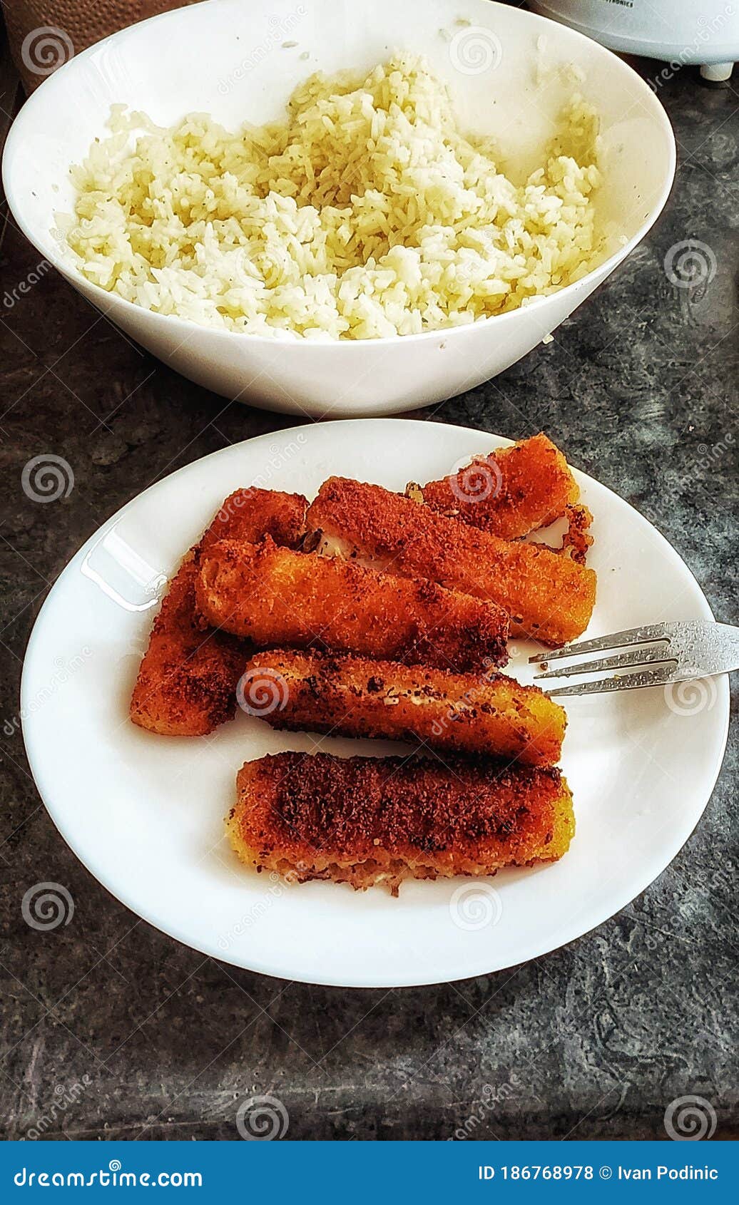 Fish Fingers and Steamed Rice As a Breakfast Stock Photo - Image of ...
