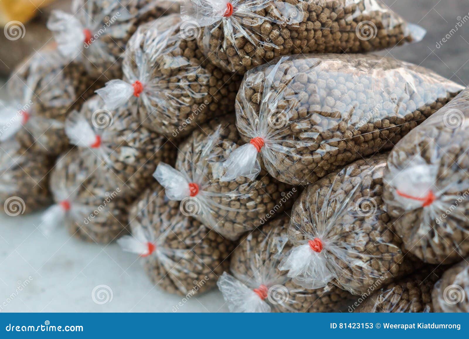 Fish food in plastic bags stock image. Image of food - 81423153