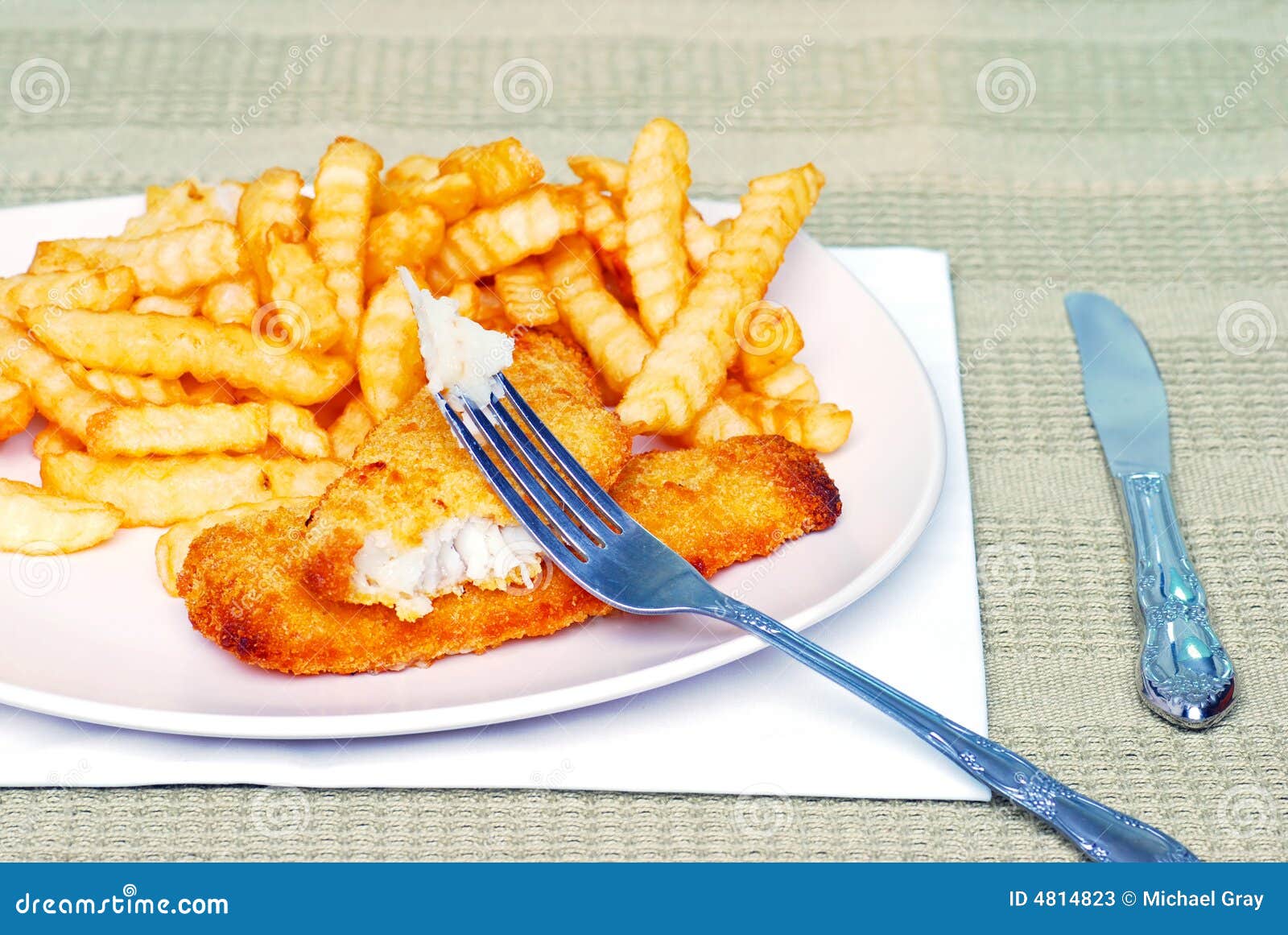 Fish and French Fries with Fish on a Fork Stock Image - Image of golden ...