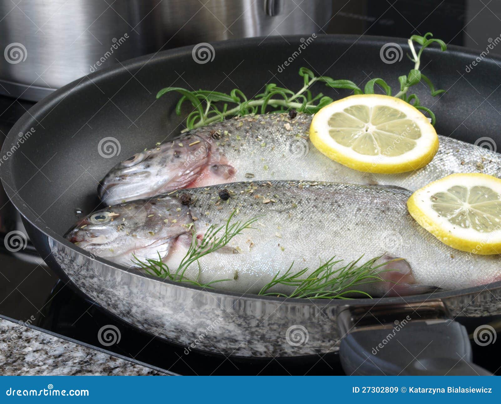 Fish on frying pan stock image. Image of head, trouts - 27302809