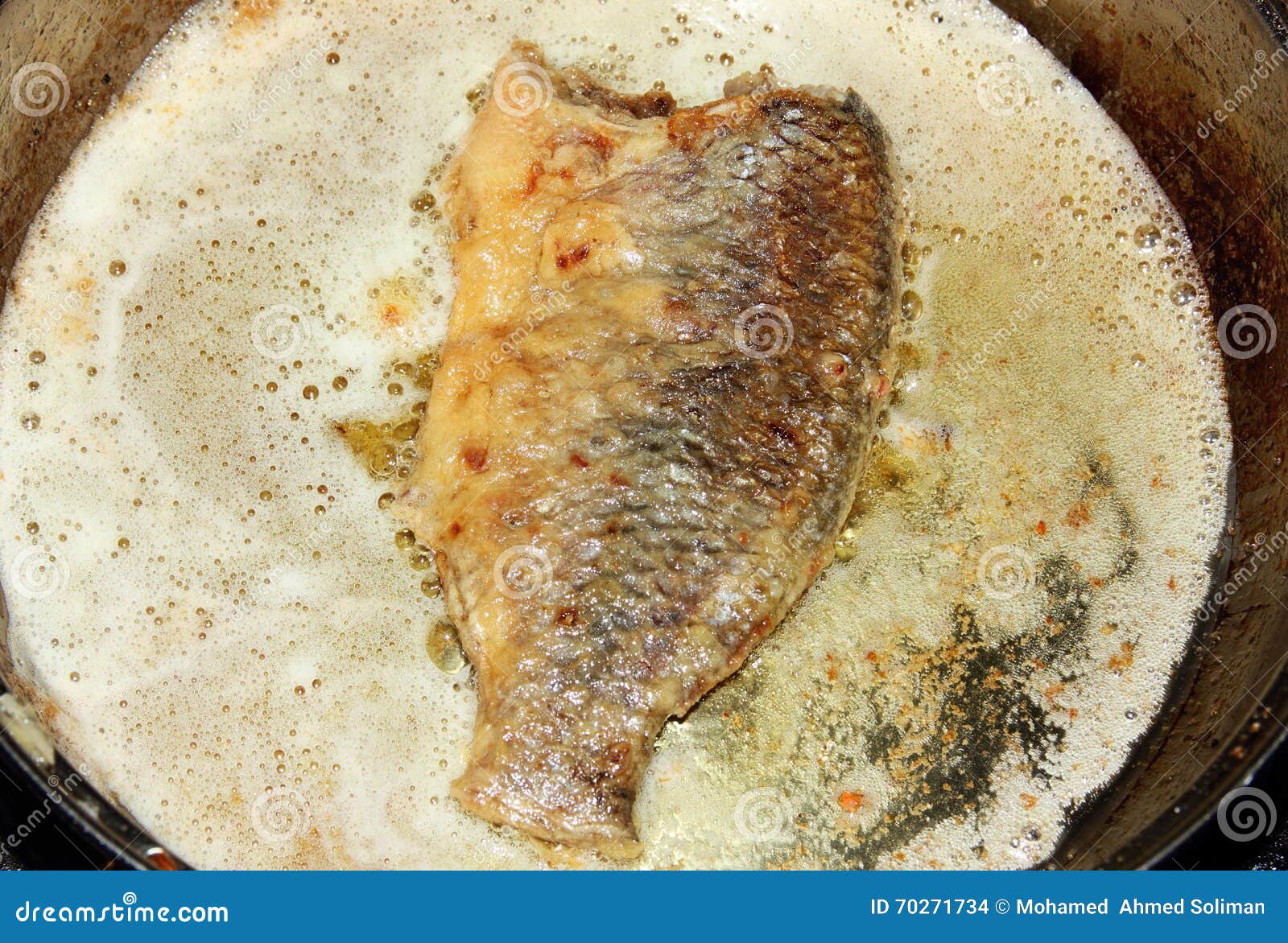 Fish frying in pan stock photo. Image of nutritive, cooking - 70271734