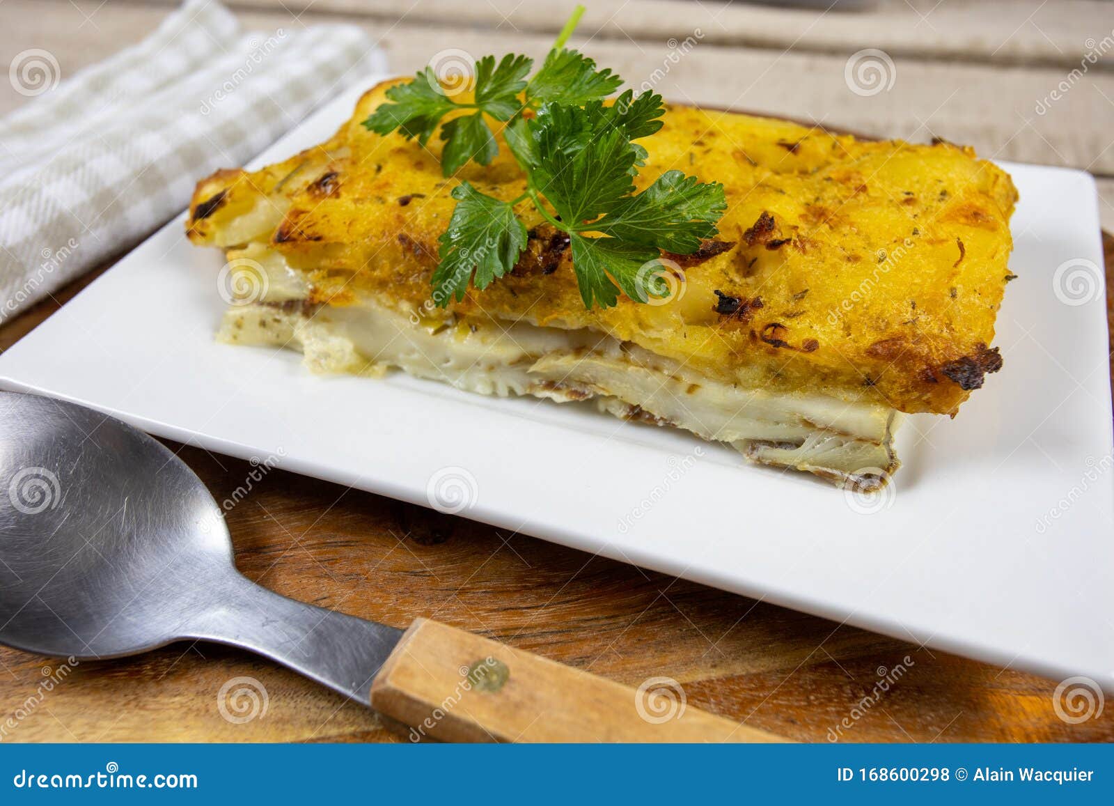 Fish gratin on a table stock photo. Image of parmentier - 168600298