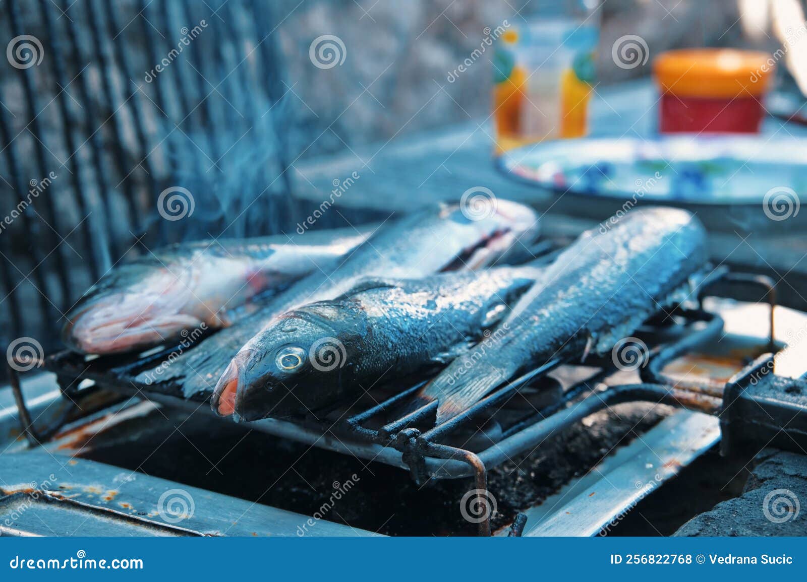 Fish on gridiron stock photo. Image of foreground, lunch - 256822768