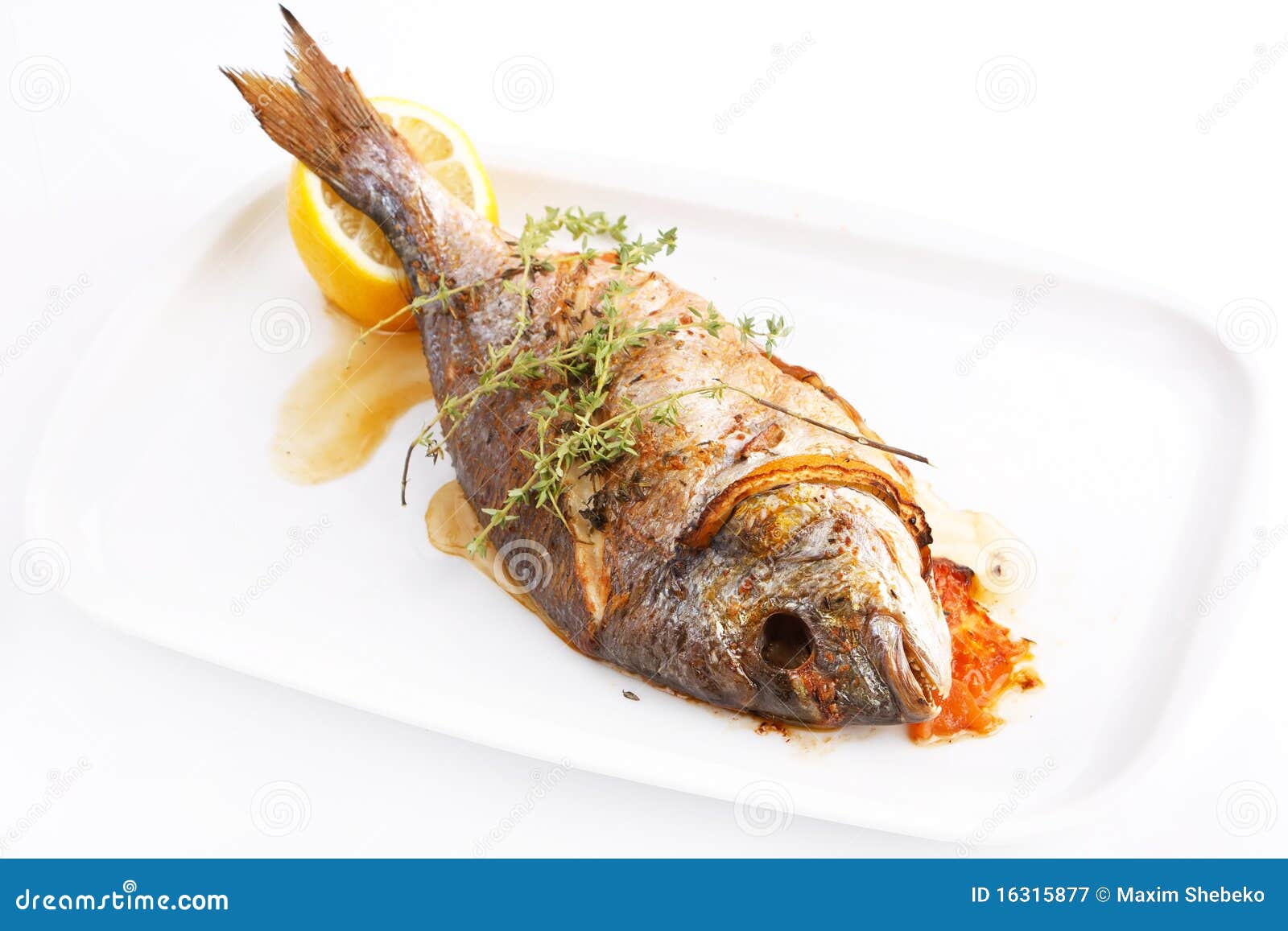 Fish with lemon stock image. Image of dorado, meal, food - 16315877