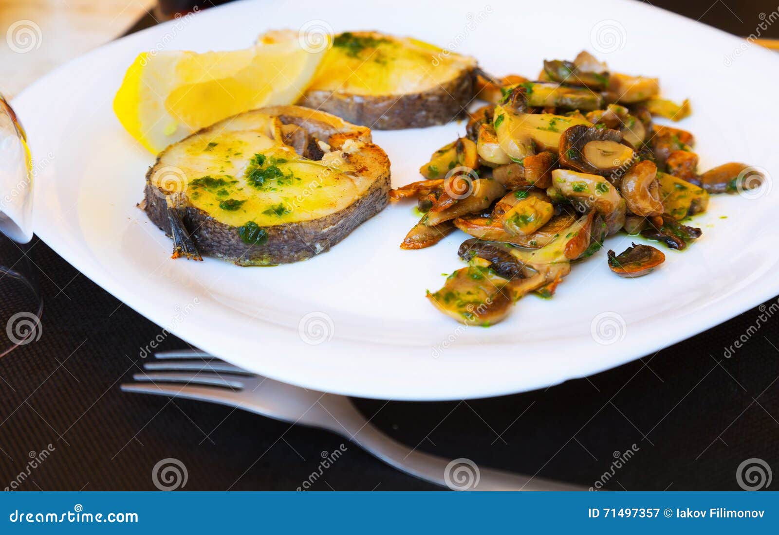 Fish with Mushrooms on Plate Stock Image - Image of cooked, lemon: 71497357
