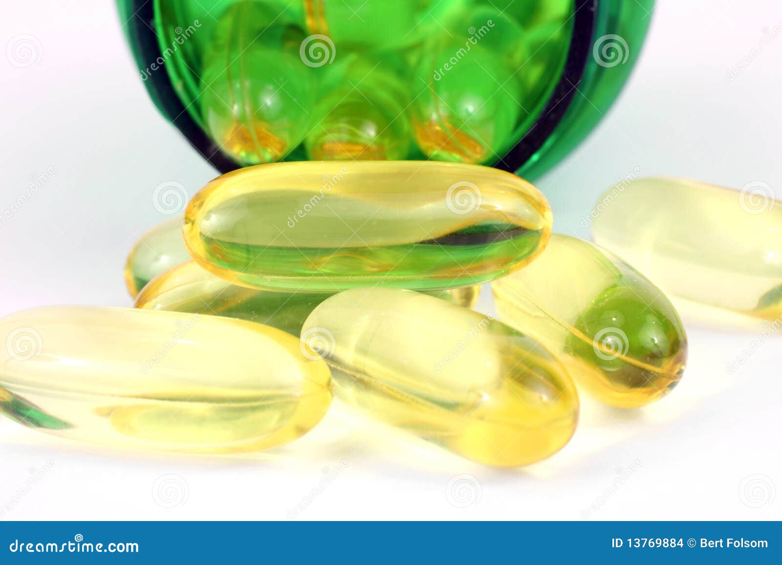 Fish Oil Capsules with Green Pill Bottle Stock Photo - Image of pill ...