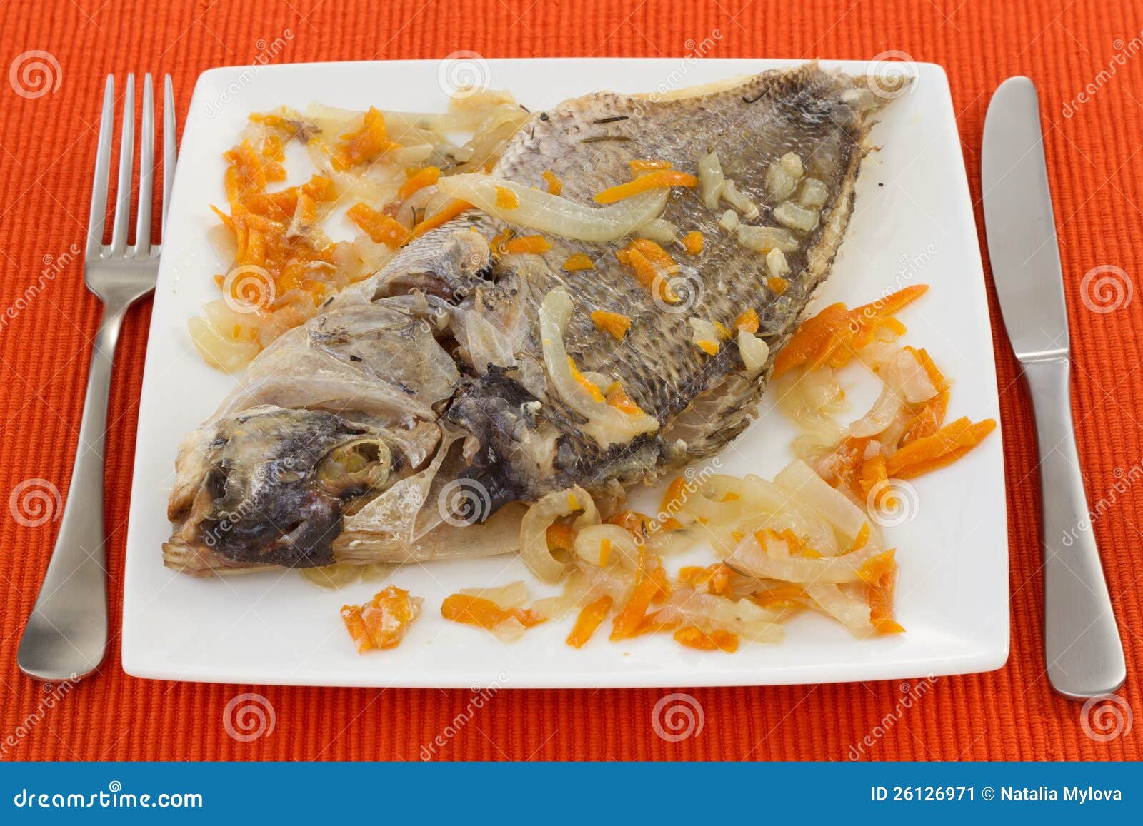 Fish with onion and carrot stock image. Image of health - 26126971