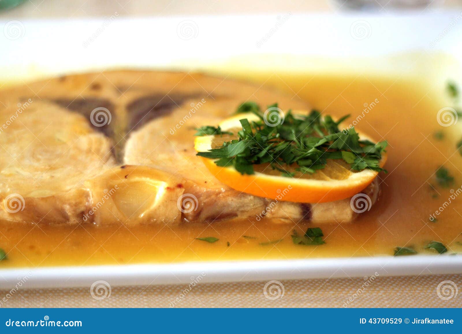 Fish in orange sauce stock image. Image of orange, healthy - 43709529