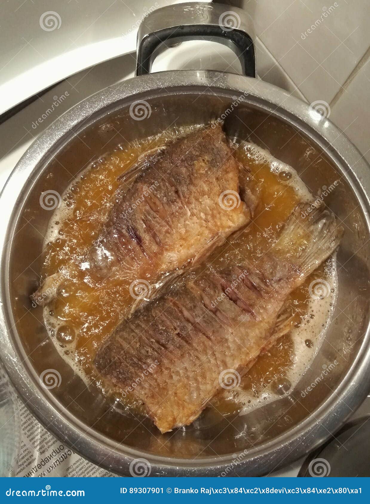 Fish in the pan stock image. Image of fried, delicious - 89307901