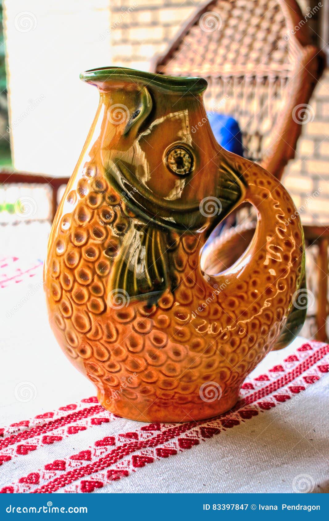 Fish Pitcher stock image. Image of brown, shaped, water - 83397847