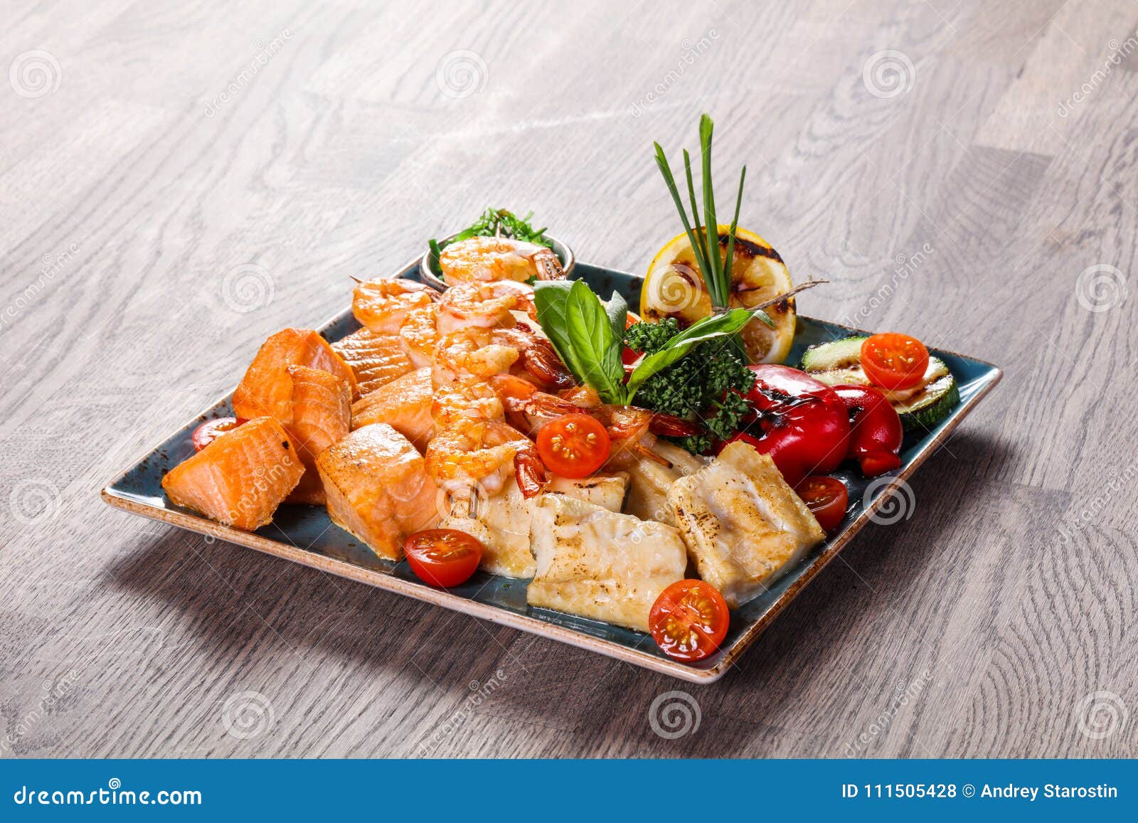 Fish and prawn plate stock photo. Image of crustacean - 111505428