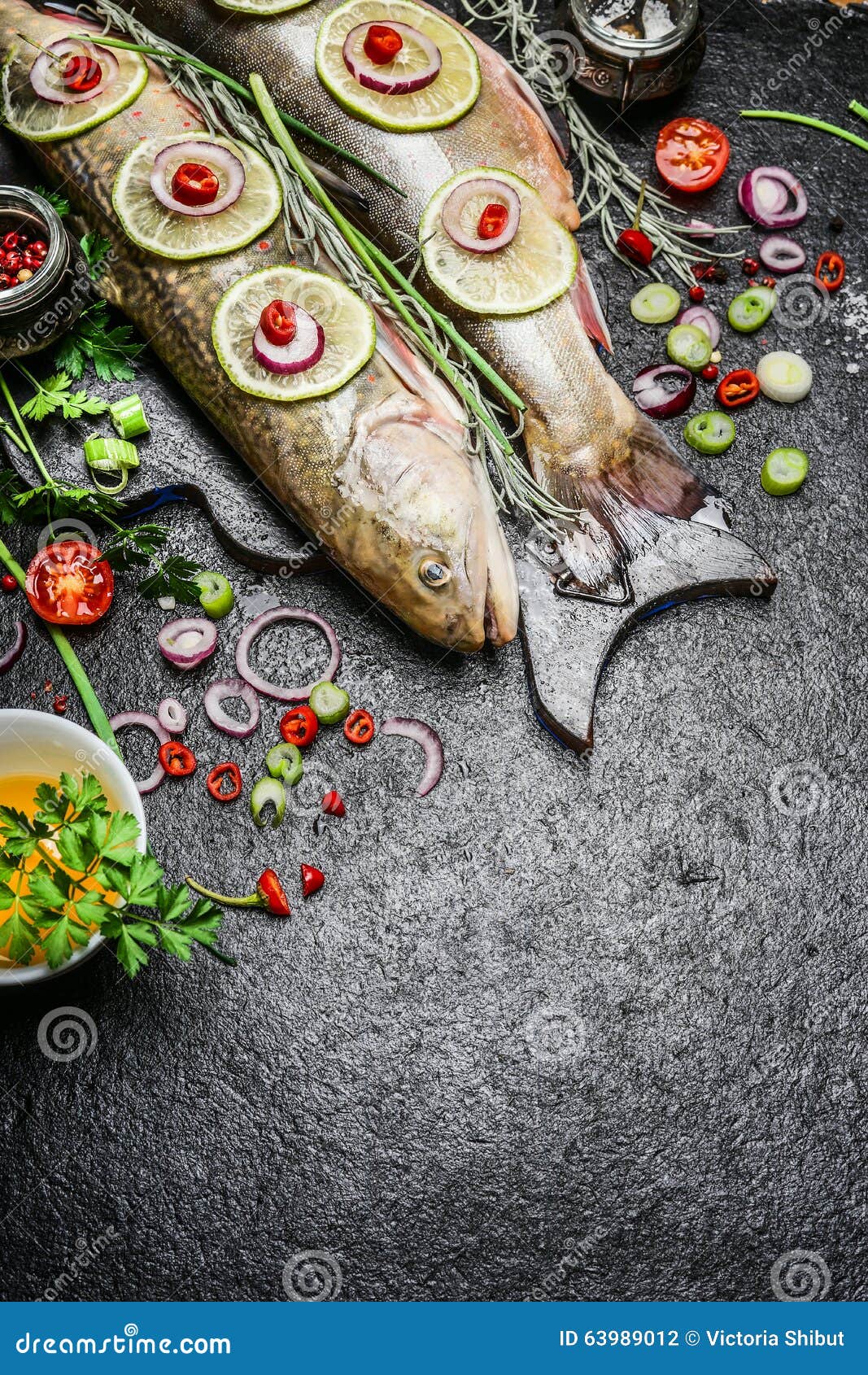 Fish Preparation with Various Ingredients for Cooking on Rustic ...