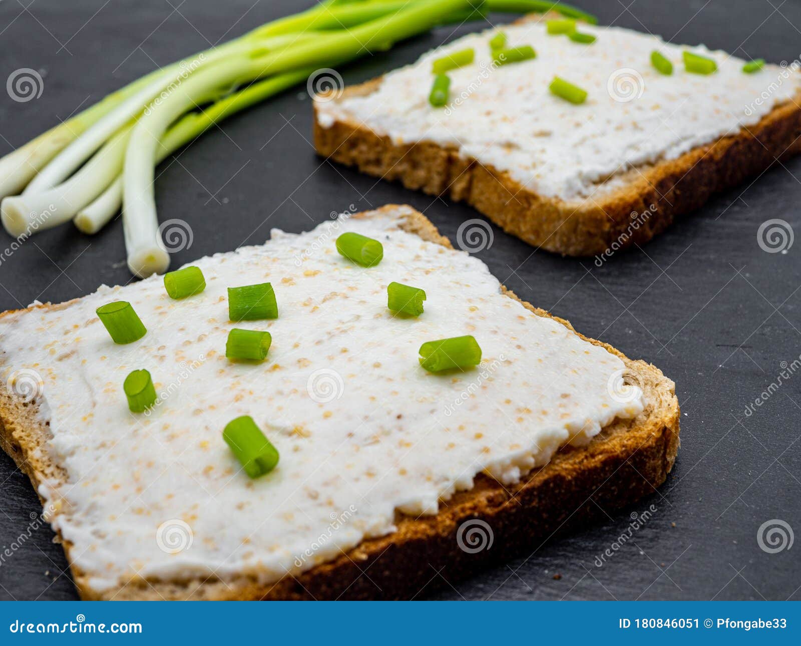 Fish Roe Paste Spread on Bread Slices and Green Onion on Slate ...