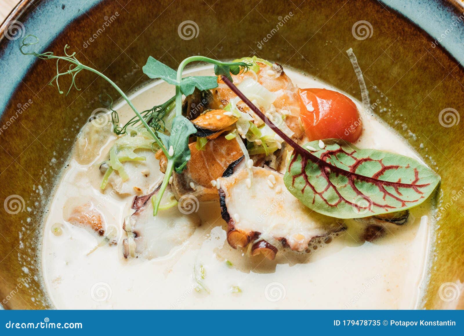 Fish Sauce in a Deep Plate with Fish, Seafood, Sauce and Vegetables ...