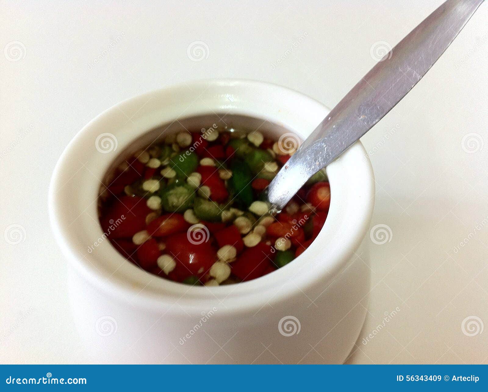 Fish Sauce in a white cup stock image. Image of table - 56343409