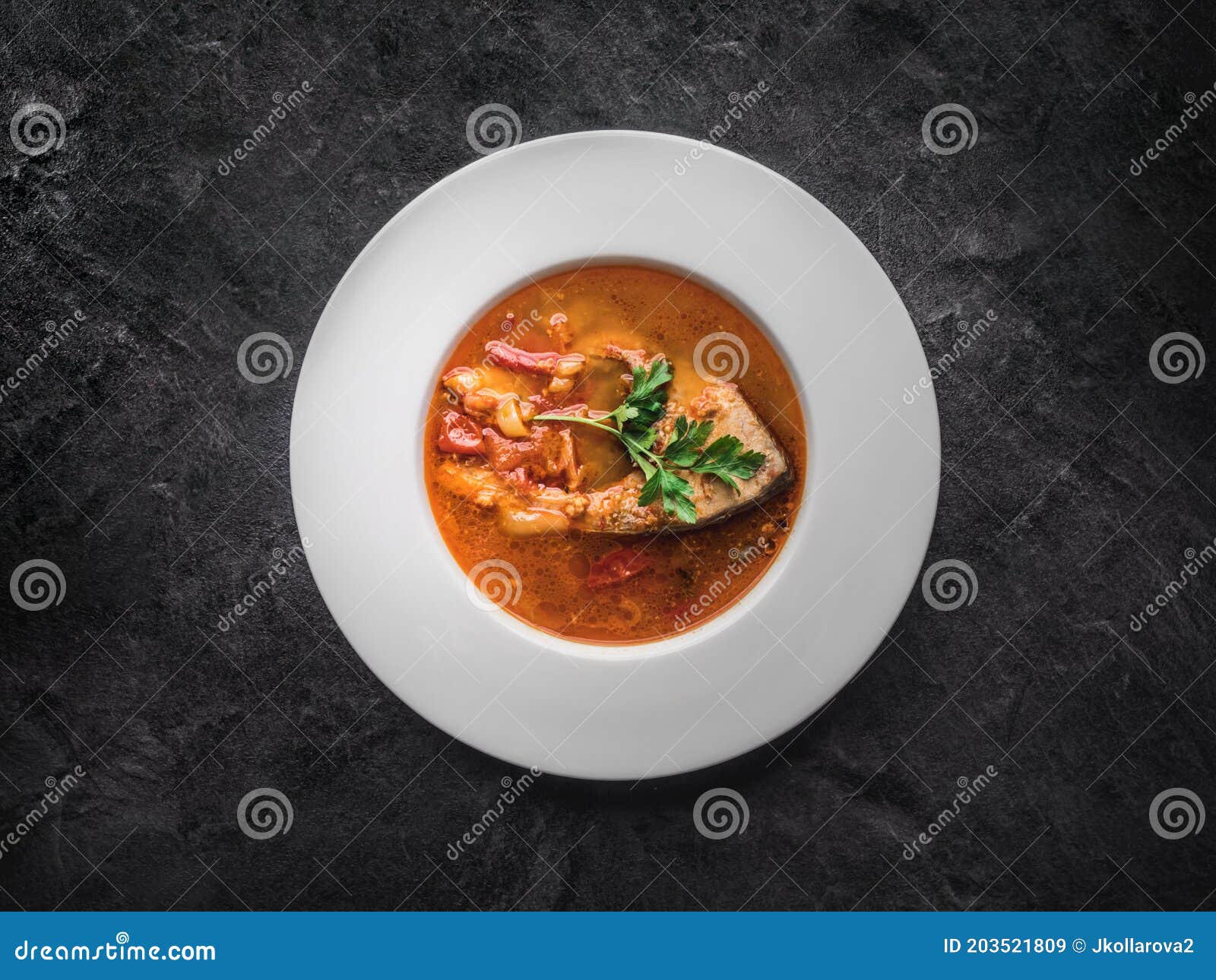 Fish Soup in White Plate on Dark Background. Overhead View Stock Image ...