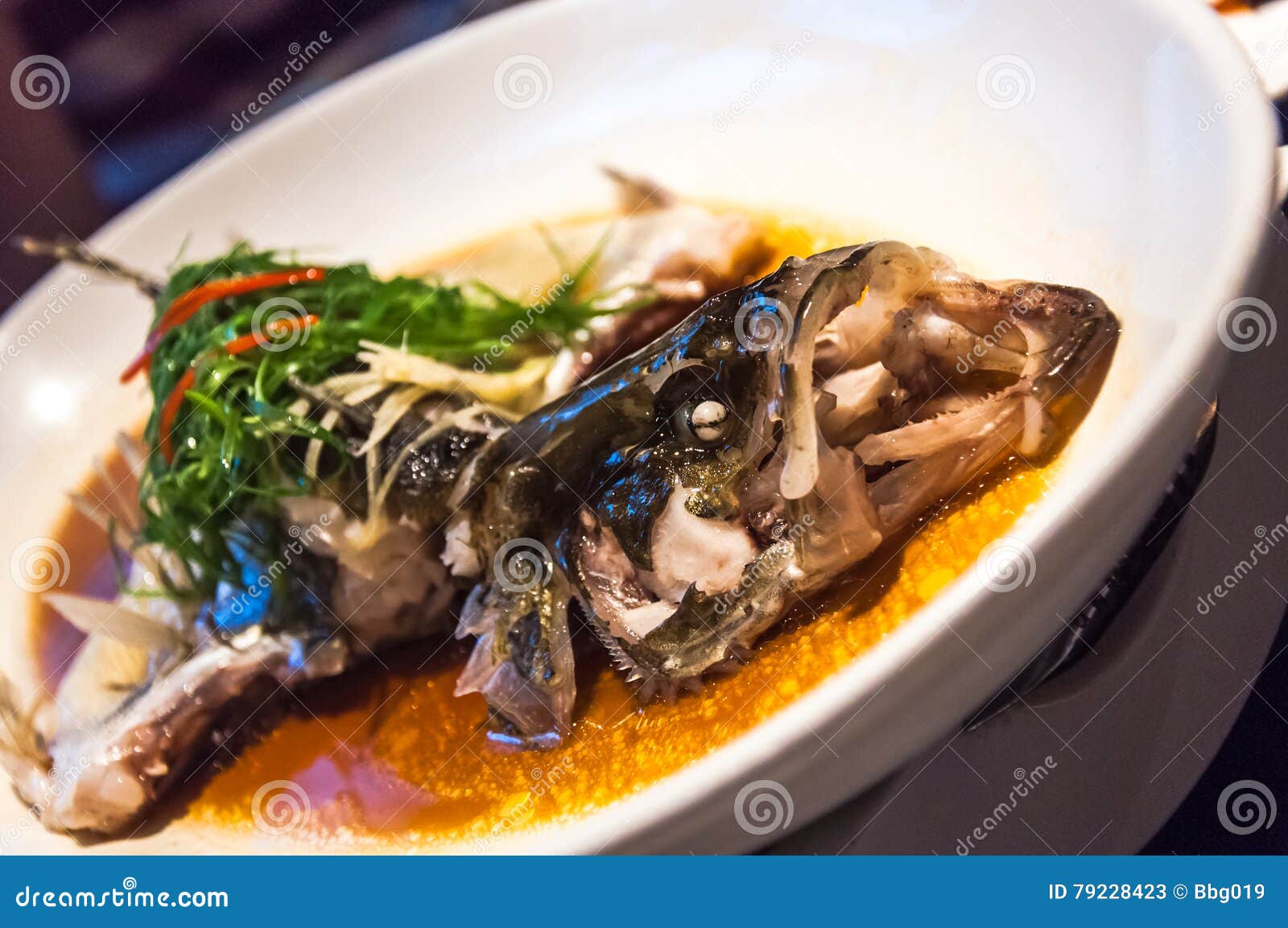 Steamed Snake Head Fish With Mushroom And Slice Ginger On Plate Royalty ...