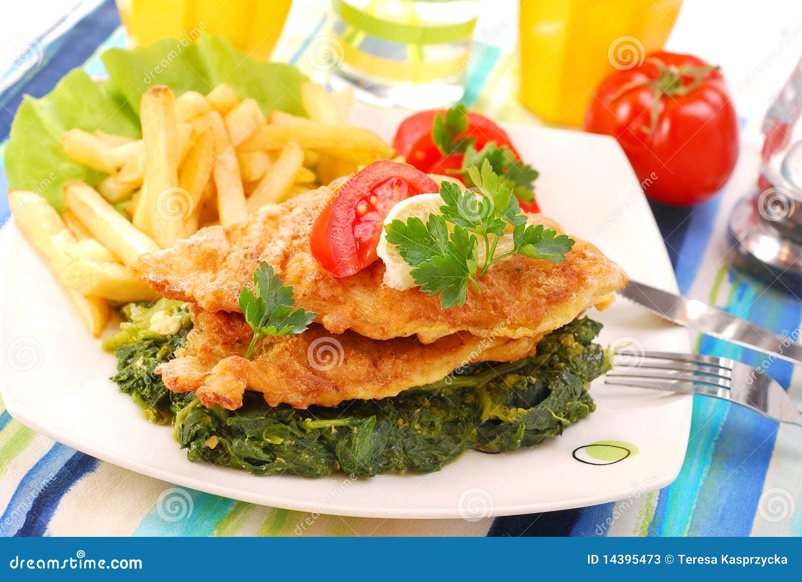 Fish on spinach with fries stock image. Image of diet - 14395473