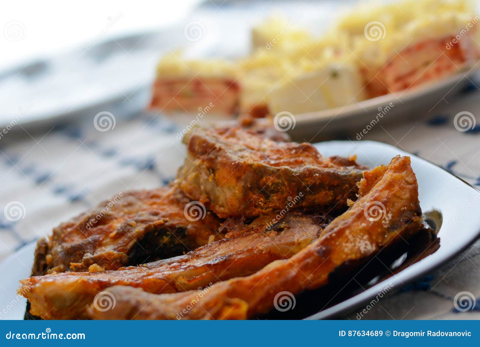 Fish Stakes on Plate Served on Home Table Stock Image - Image of ...