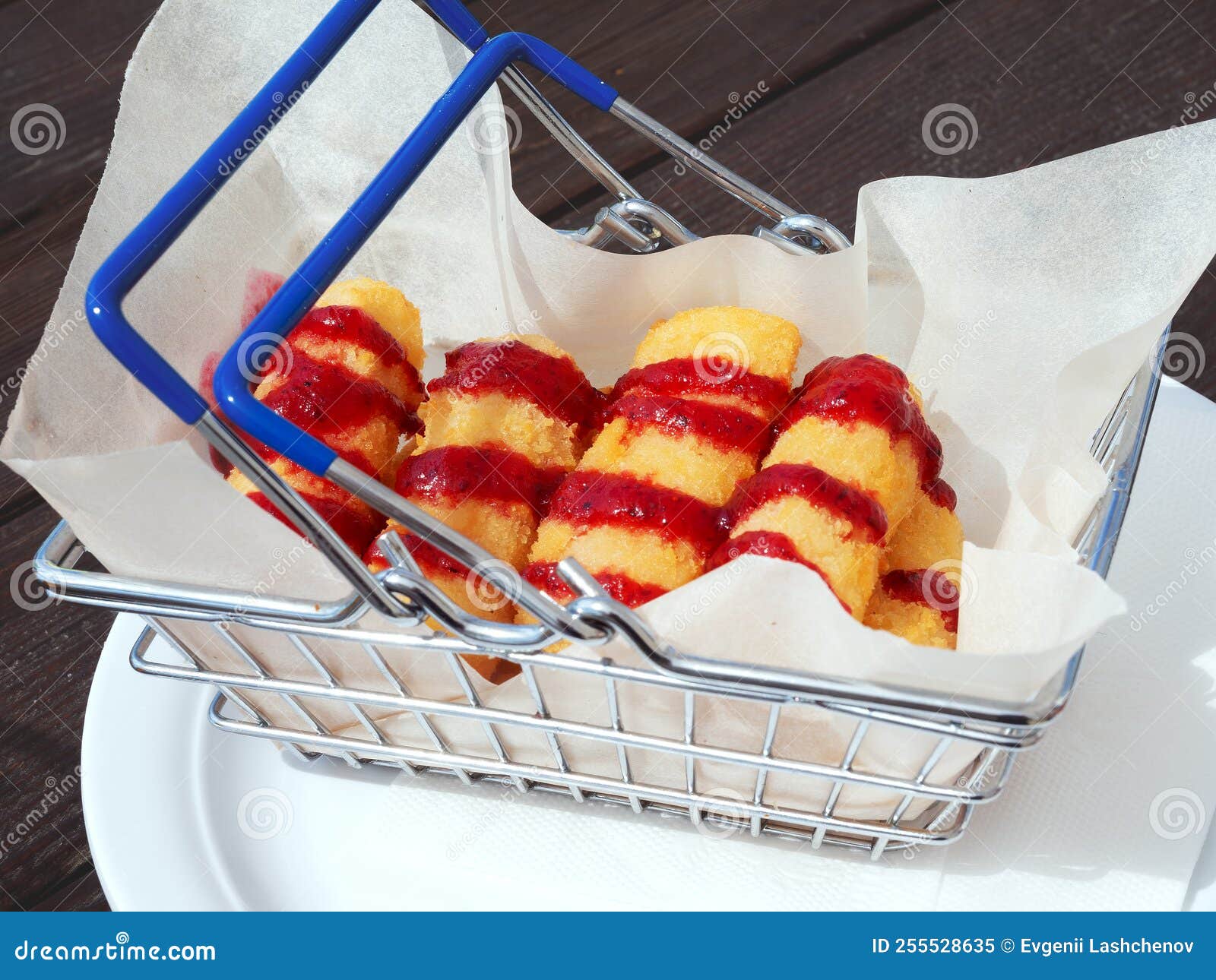 Fish Sticks in a Basket. Covered with Jam Stock Image - Image of tomato ...