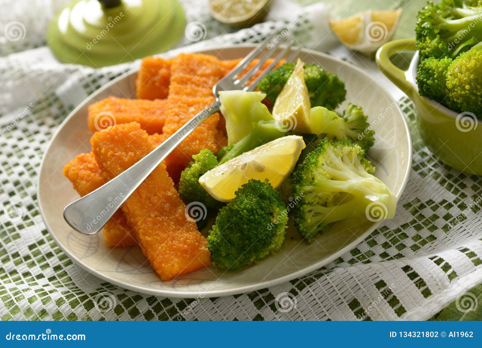 Fish Sticks with Broccoli and Lemon Garnish Stock Photo - Image of food ...