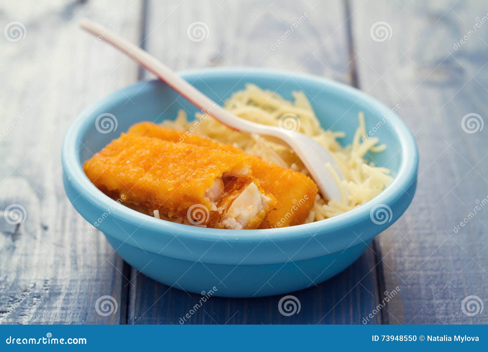 Fish Sticks with Pasta in Blue Bowl Stock Photo - Image of seafood ...