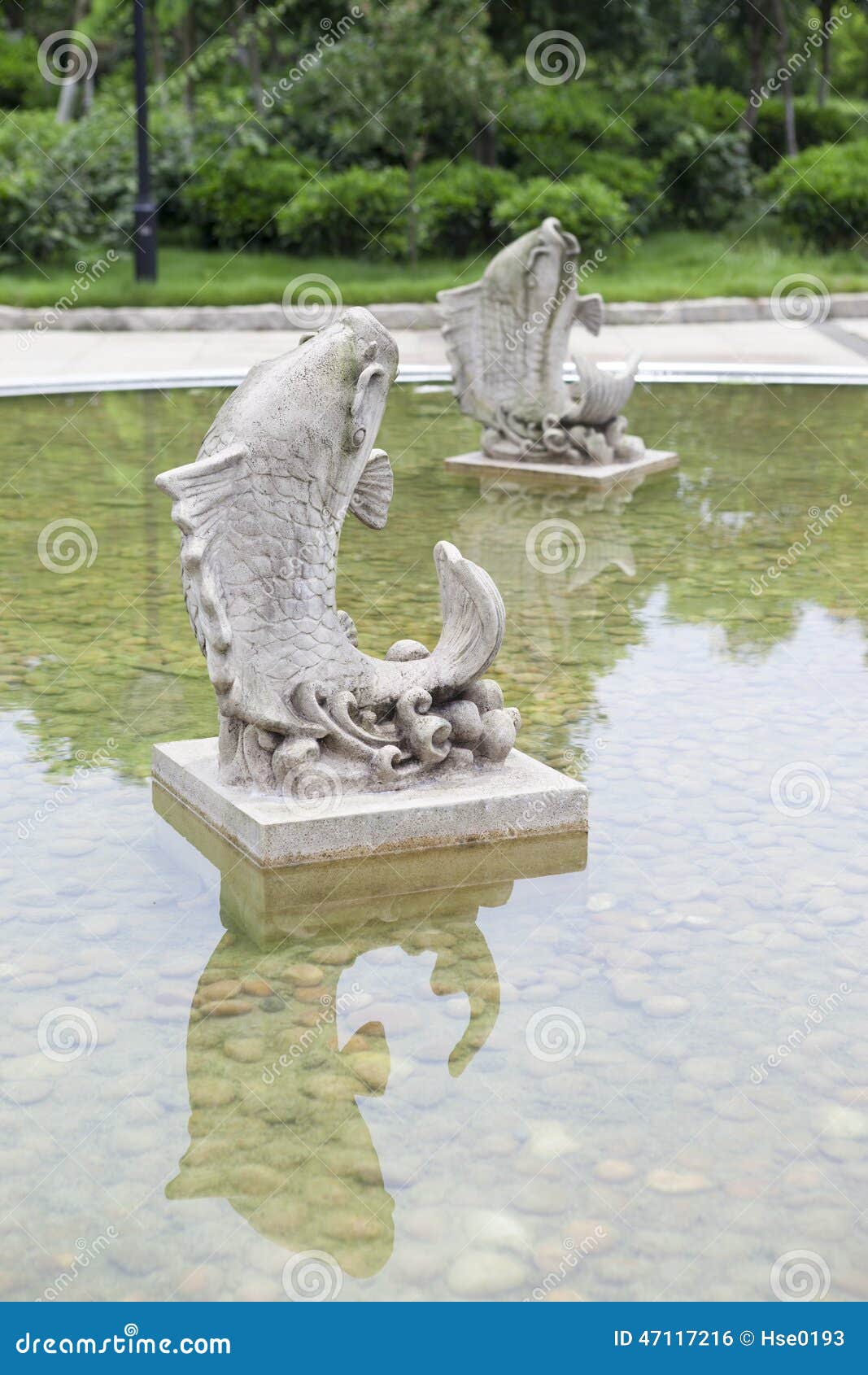 Fish stone carving stock photo. Image of water, love - 47117216